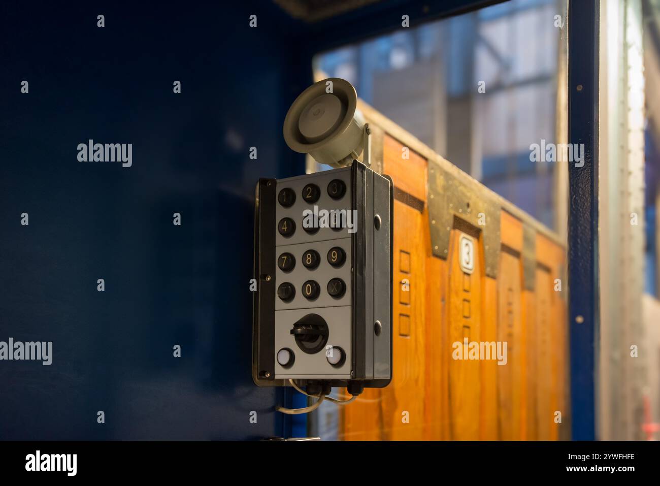 Control panel with numeric keypad in a modern industrial setting Stock ...
