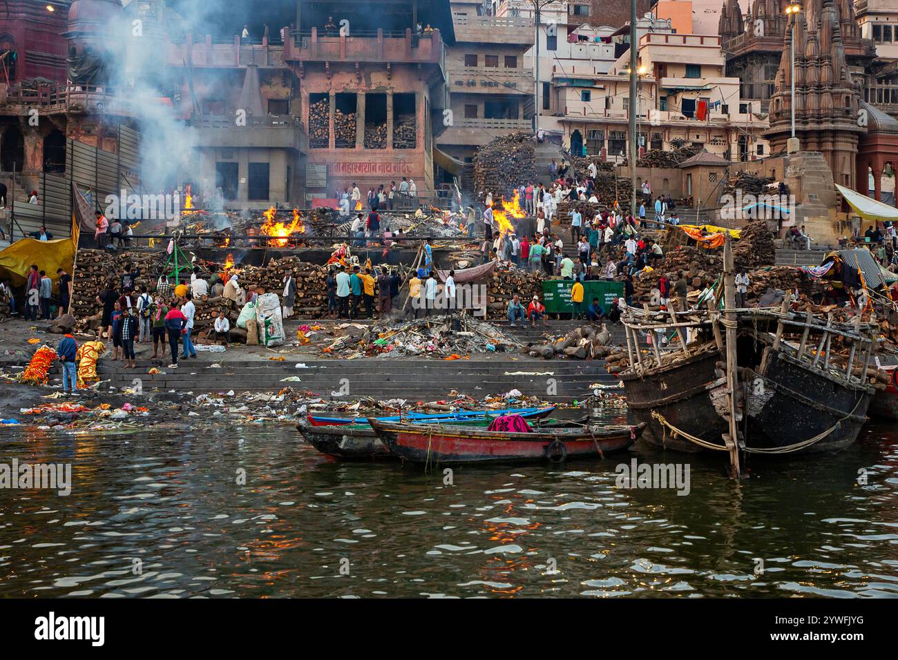 The ceremony of cremation in the Manikarnika Ghat known as one of the ...