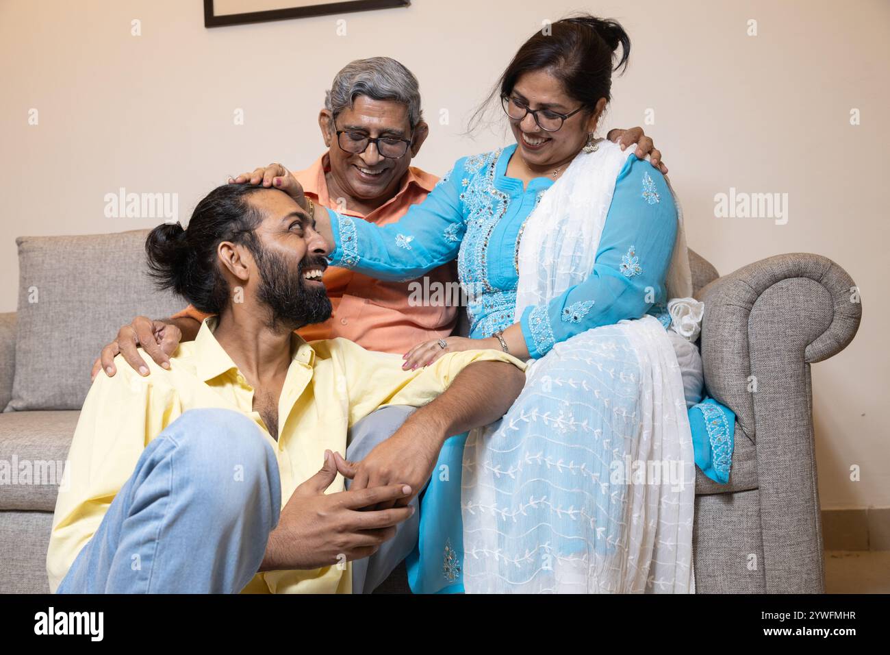Indian family spending quality hi-res stock photography and images - Alamy