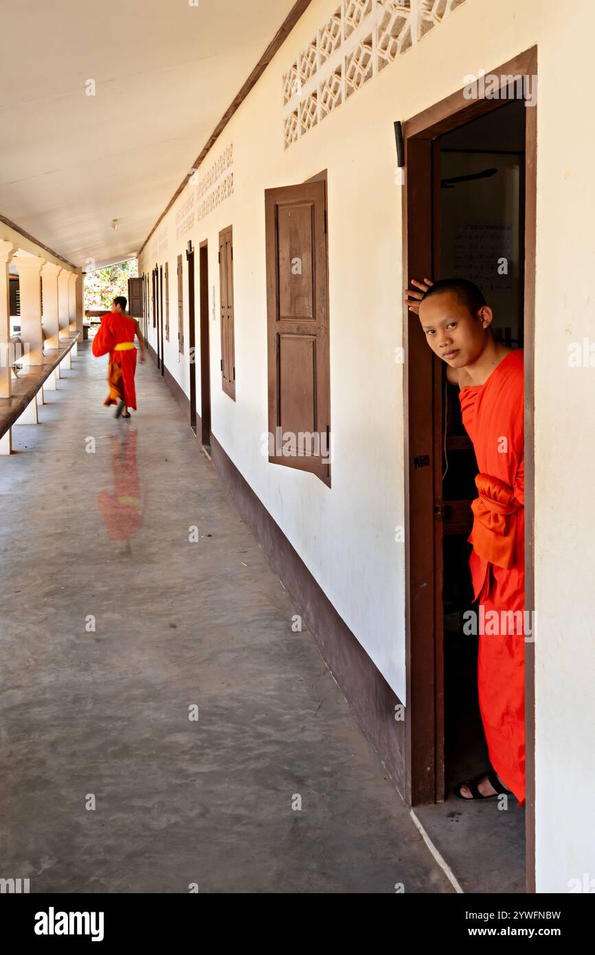 Novice buddhist monk in the school of monks in Luang Prabang, Laos ...