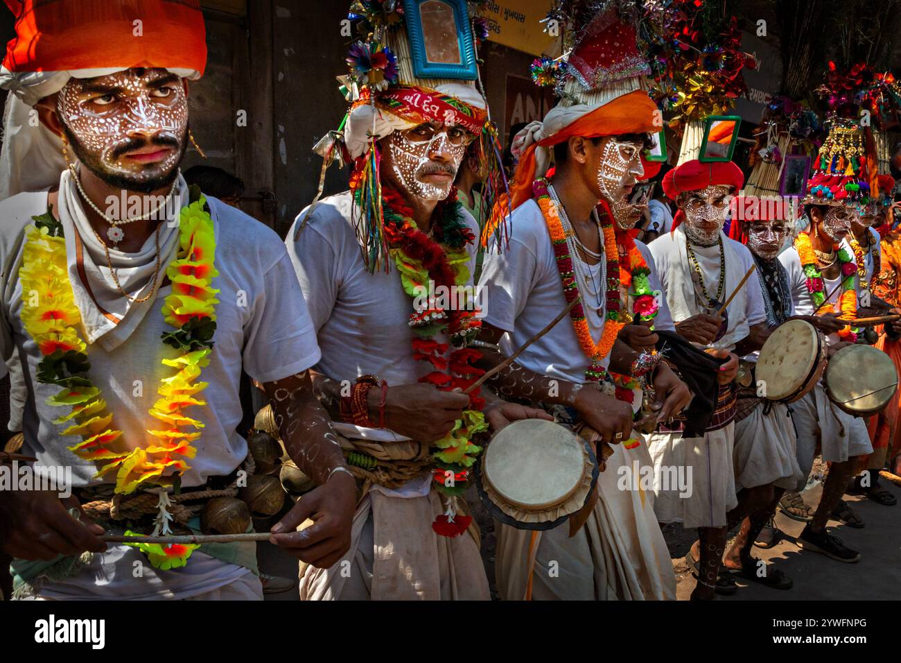 Tribal Rathva men with painted face in the annual tribal festival of ...