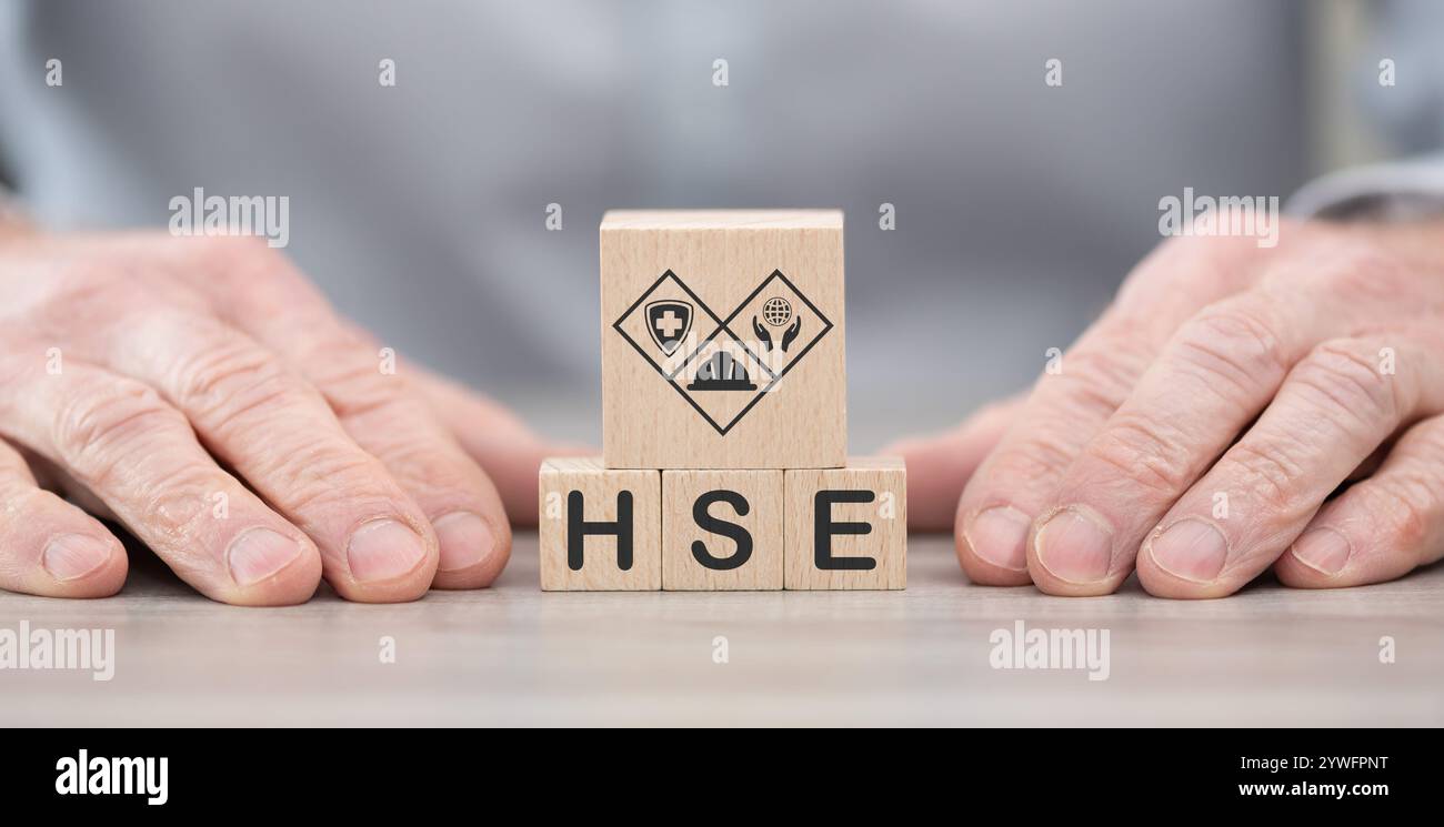 Wooden blocks with symbol of hse concept Stock Photo - Alamy