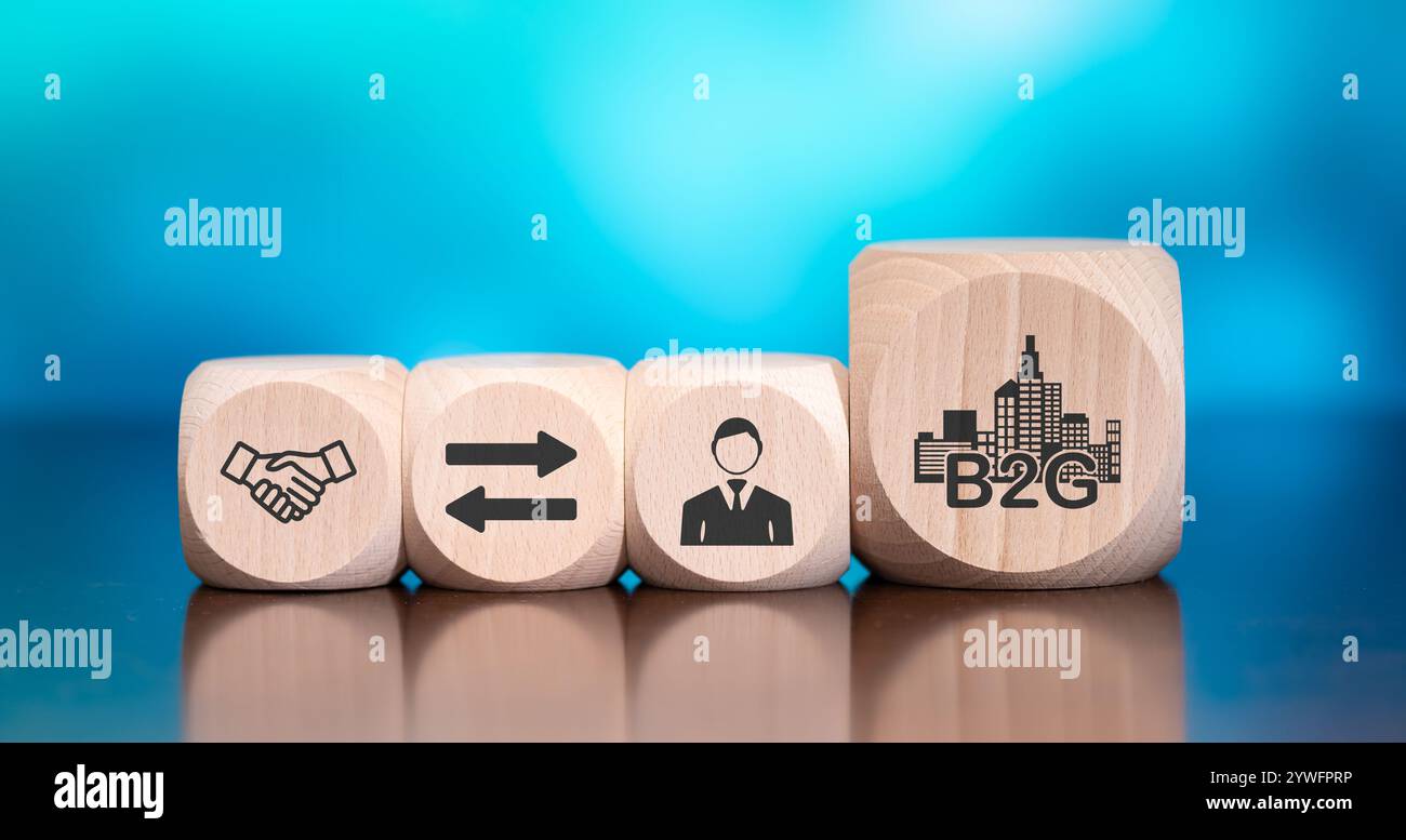 Wooden blocks with symbol of b2g concept on blue background Stock Photo ...
