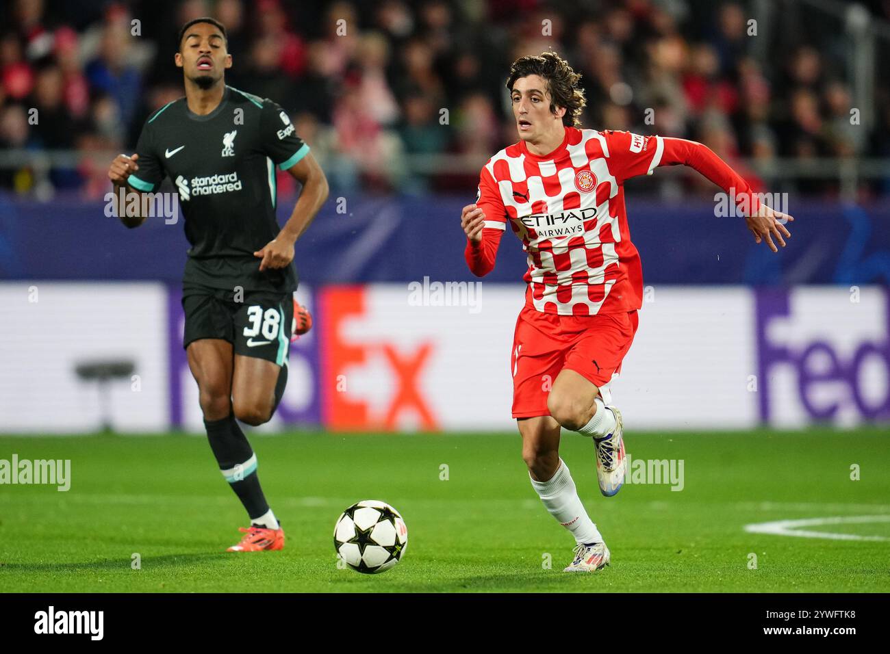 Girona, Spain. 11th Dec, 2024. Brian Gil of Girona FC and Ryan ...