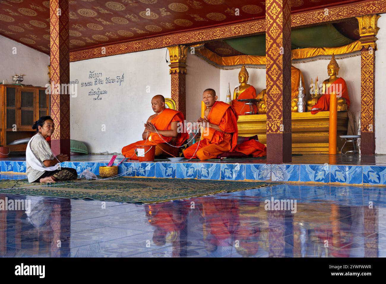 Buddhist monks blessing and praying for the wish local of woman in ...