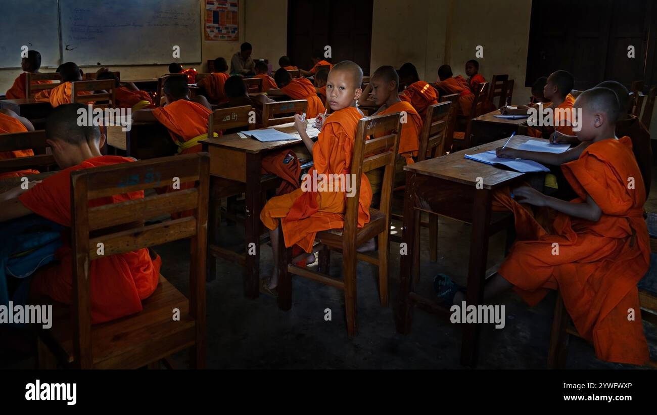 Young buddhist monks in the classroom in the monk's school in Luang ...