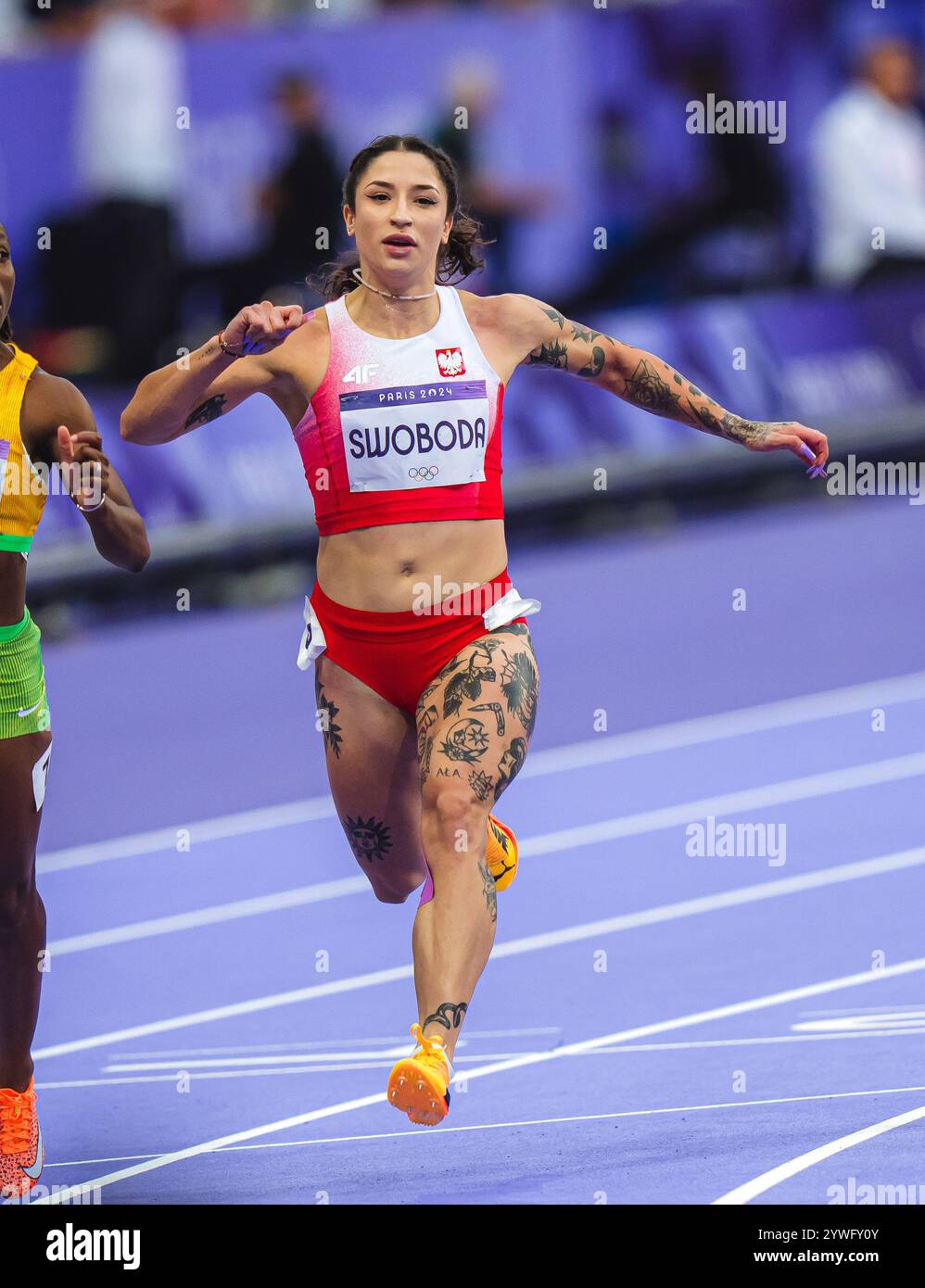 Ewa Swoboda participating in the 100 meters at the Paris 2024 Olympic ...