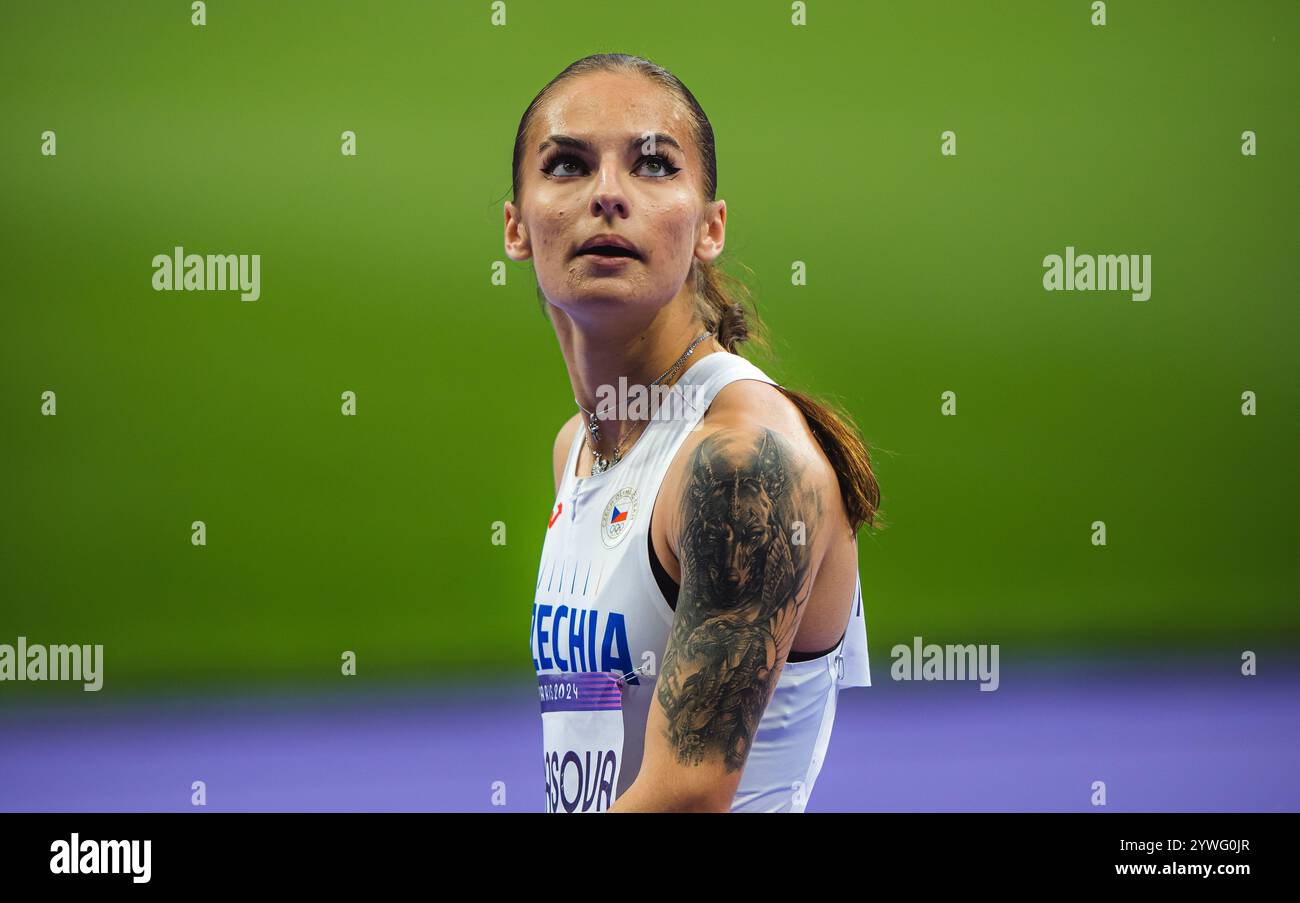 Karolína Maňasová participating in the 100 meters at the Paris 2024 ...