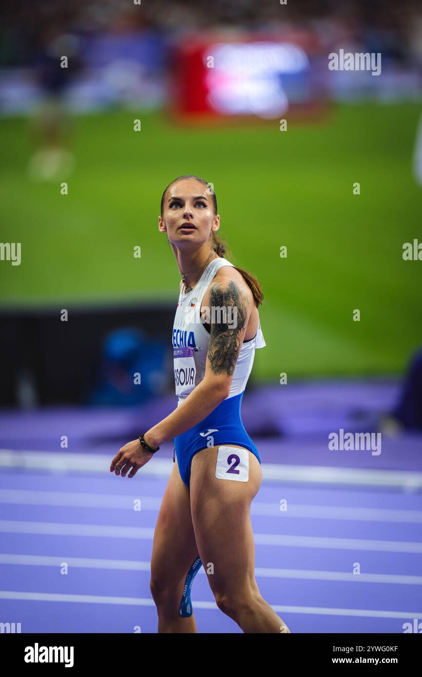 Karolína Maňasová participating in the 100 meters at the Paris 2024 ...