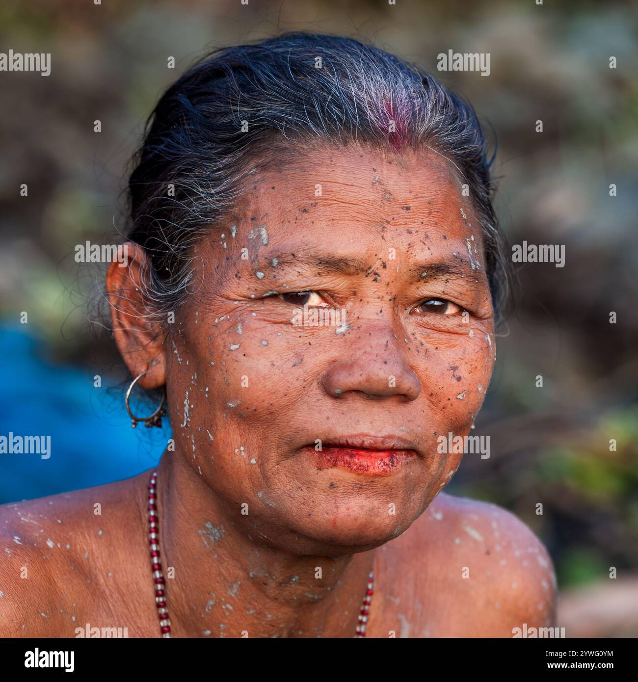 Portrait of elderly woman from the Mishing tribe from Majuli Island in the Brahmaputra river ...