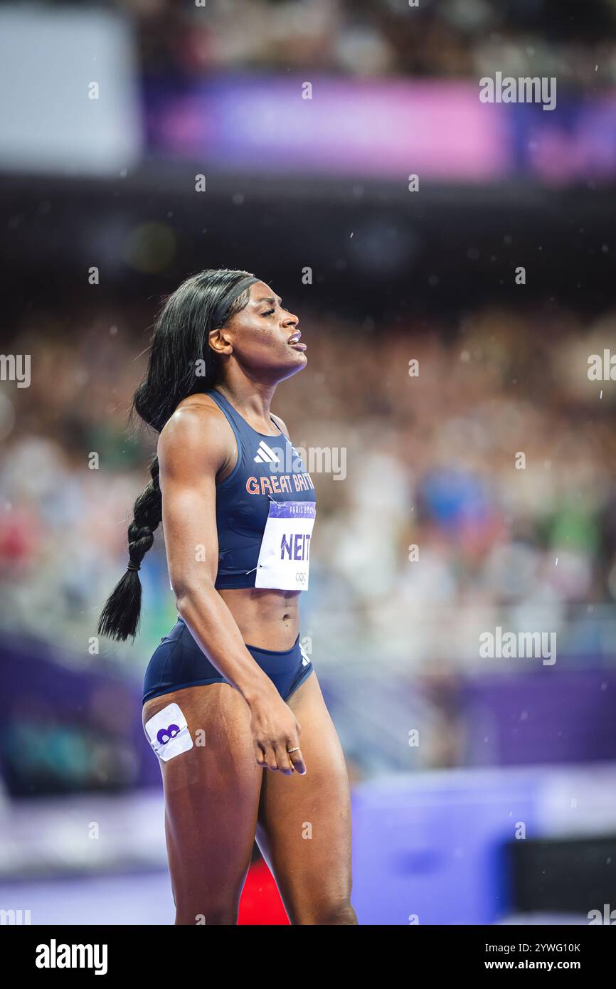 Daryll Neita participating in the 100 meters at the Paris 2024 Olympic ...