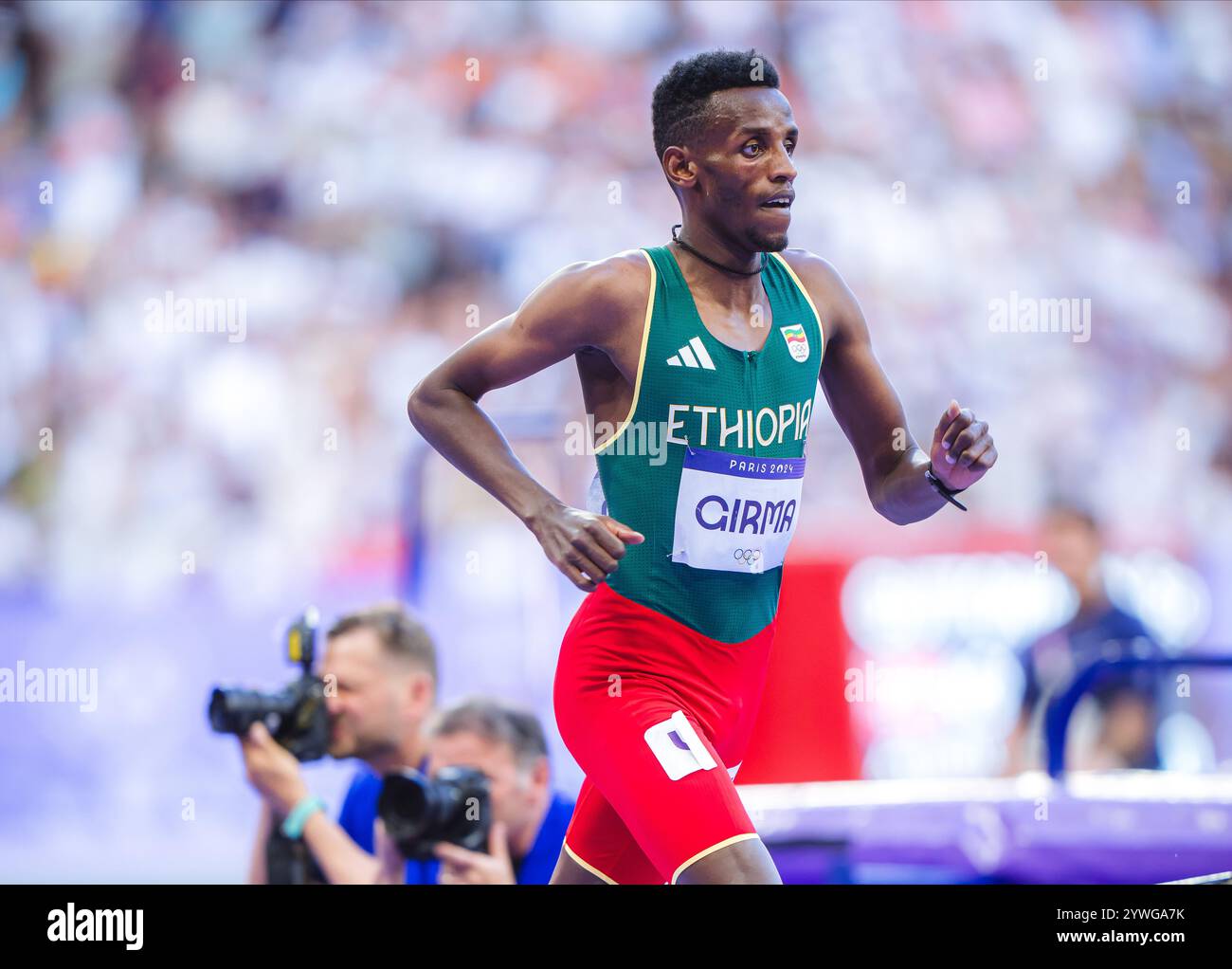 Lamecha Girma participating in the 3000 metres steeplechase at the ...