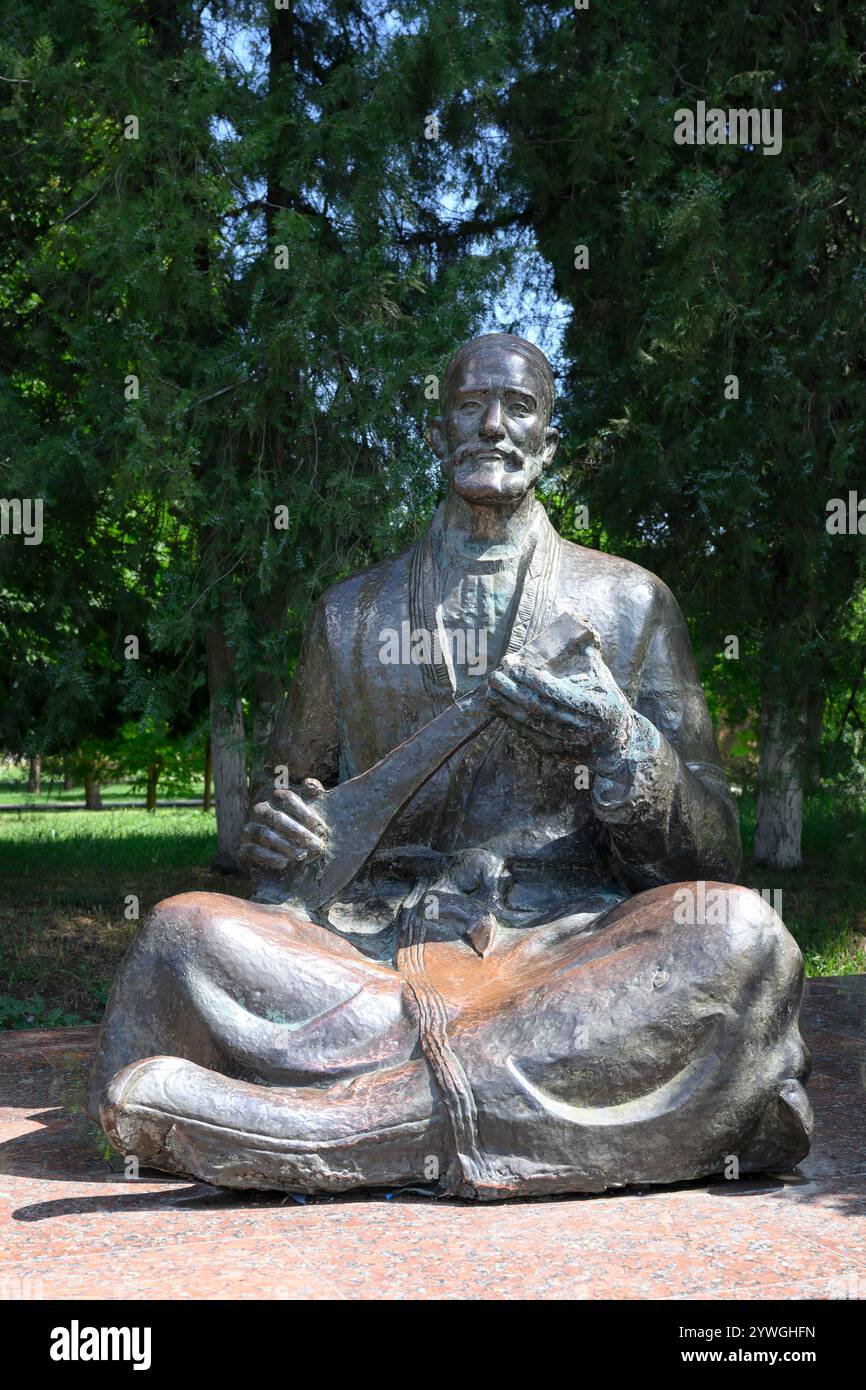 SAMARKAND, UZBEKISTAN - MAY 18, 2024. Sculpture of a musician with a ...
