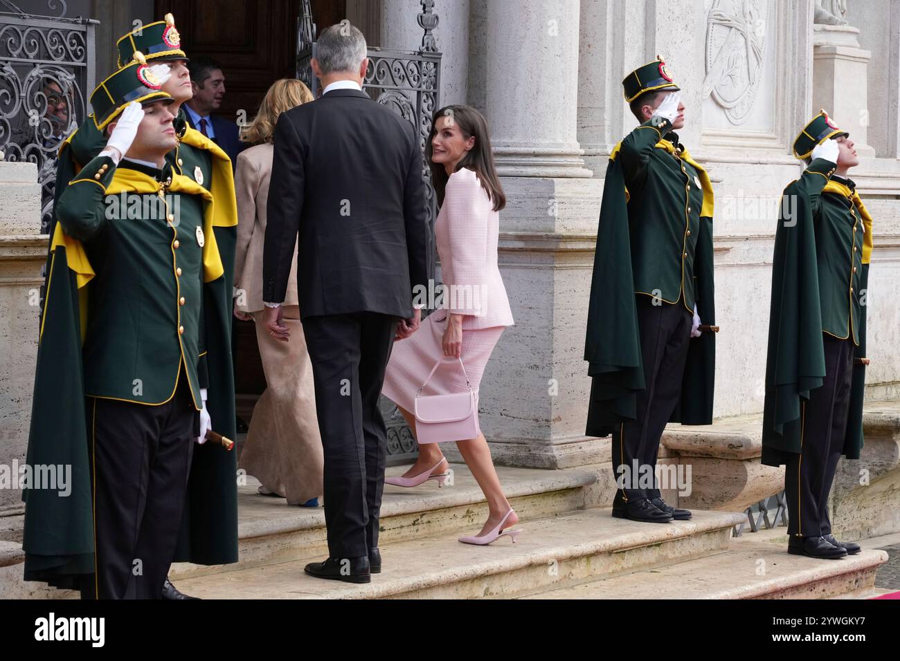 King of Spain, Felipe VI, back to camera, and Queen Letizia, right ...