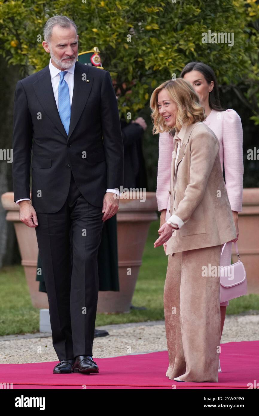 King of Spain, Felipe VI, left, and Queen Letizia, right, meet with ...
