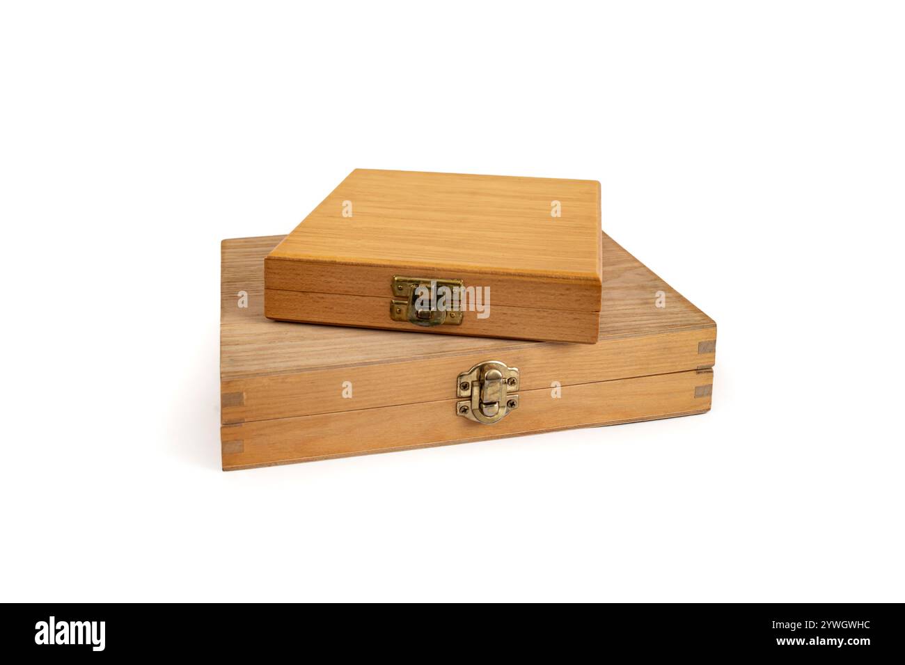 Wooden boxes with closed lid stacked and isolated on white background ...