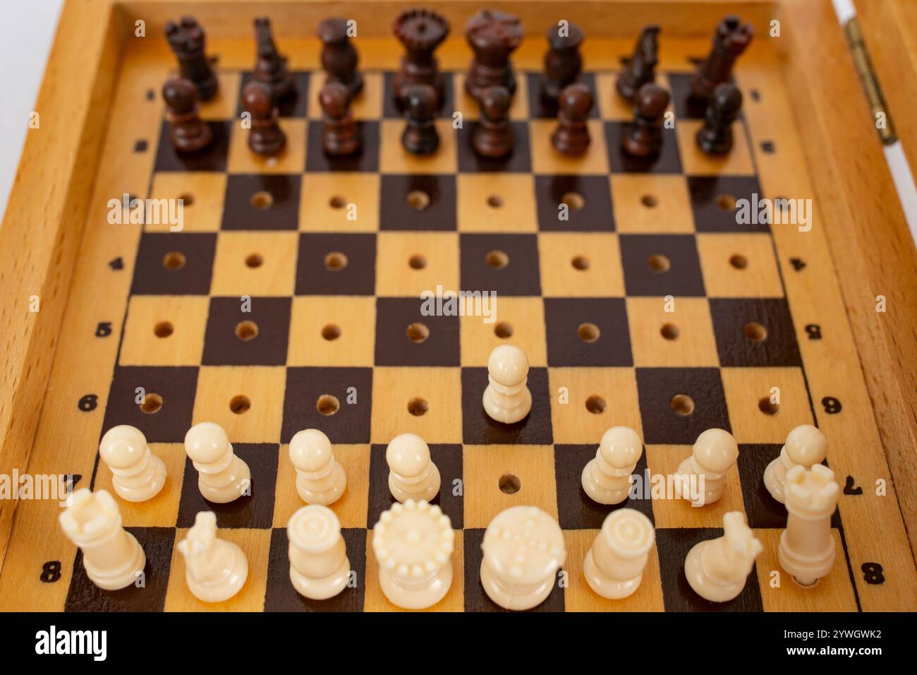 Miniature chess pieces on a pocket size chess board, soft focus Stock ...