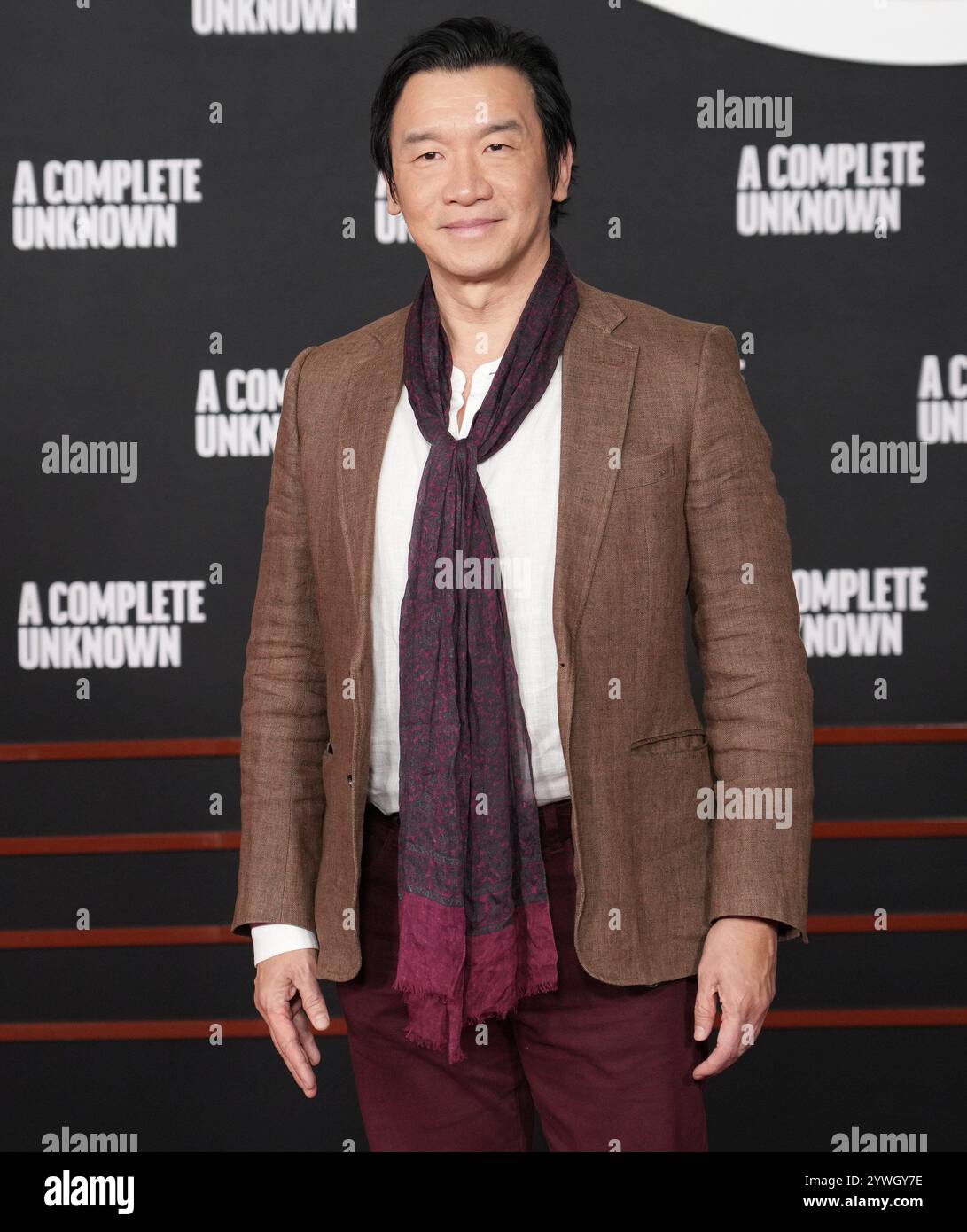 Los Angeles, USA. 10th Dec, 2024. Chin Han arrives at A COMPLETE ...