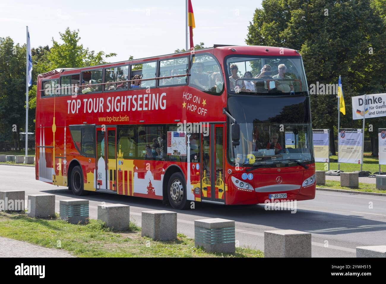 A red double-decker bus for city tours in Berlin with advertising ...
