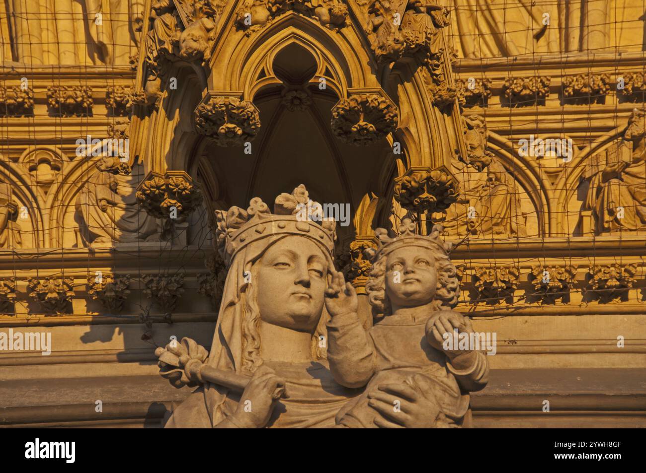 Main portal of the west facade of Cologne Cathedral with statue of the ...