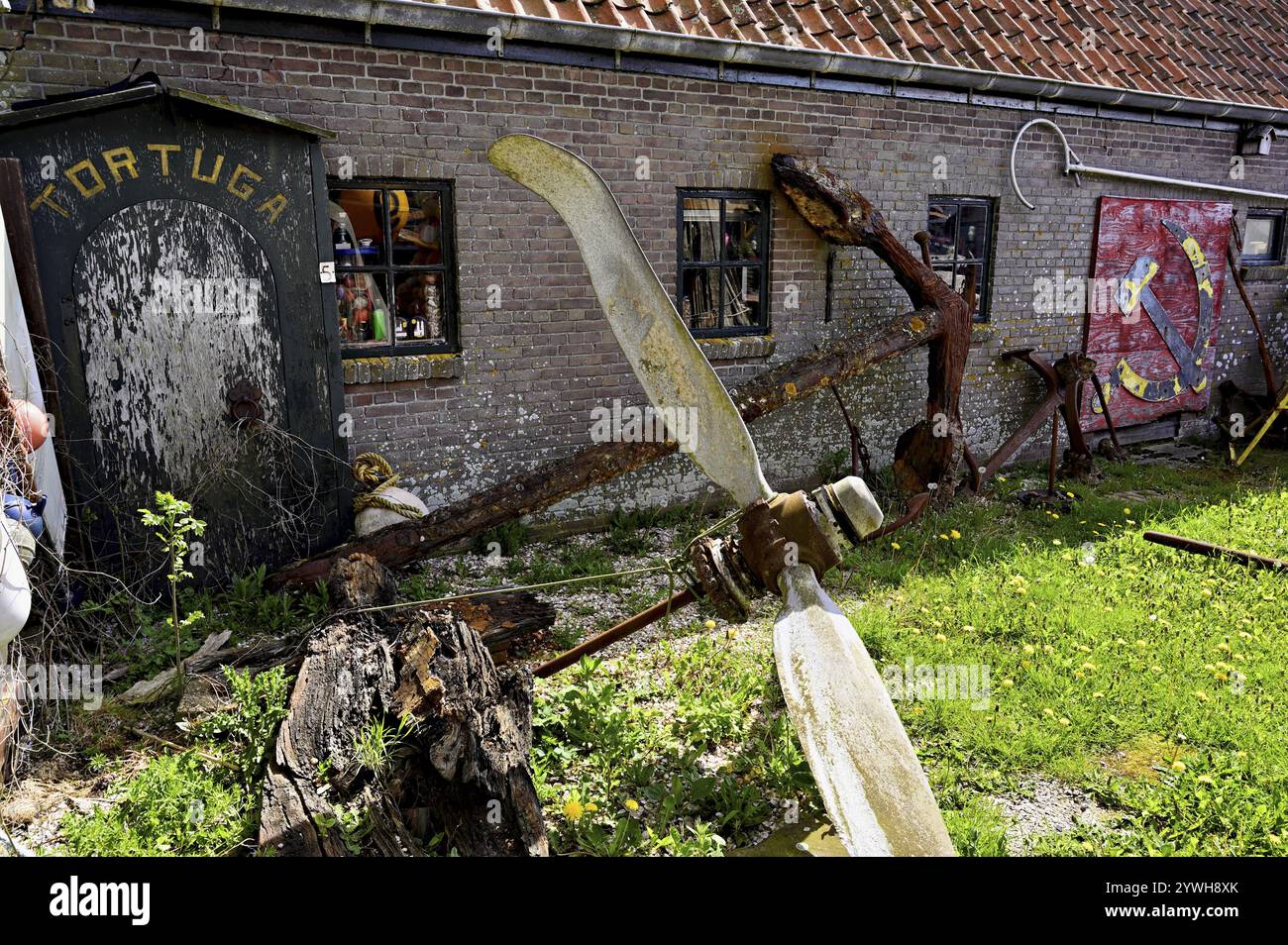 Old fish propeller fished out of the sea by a beachcomber, Maritime and ...