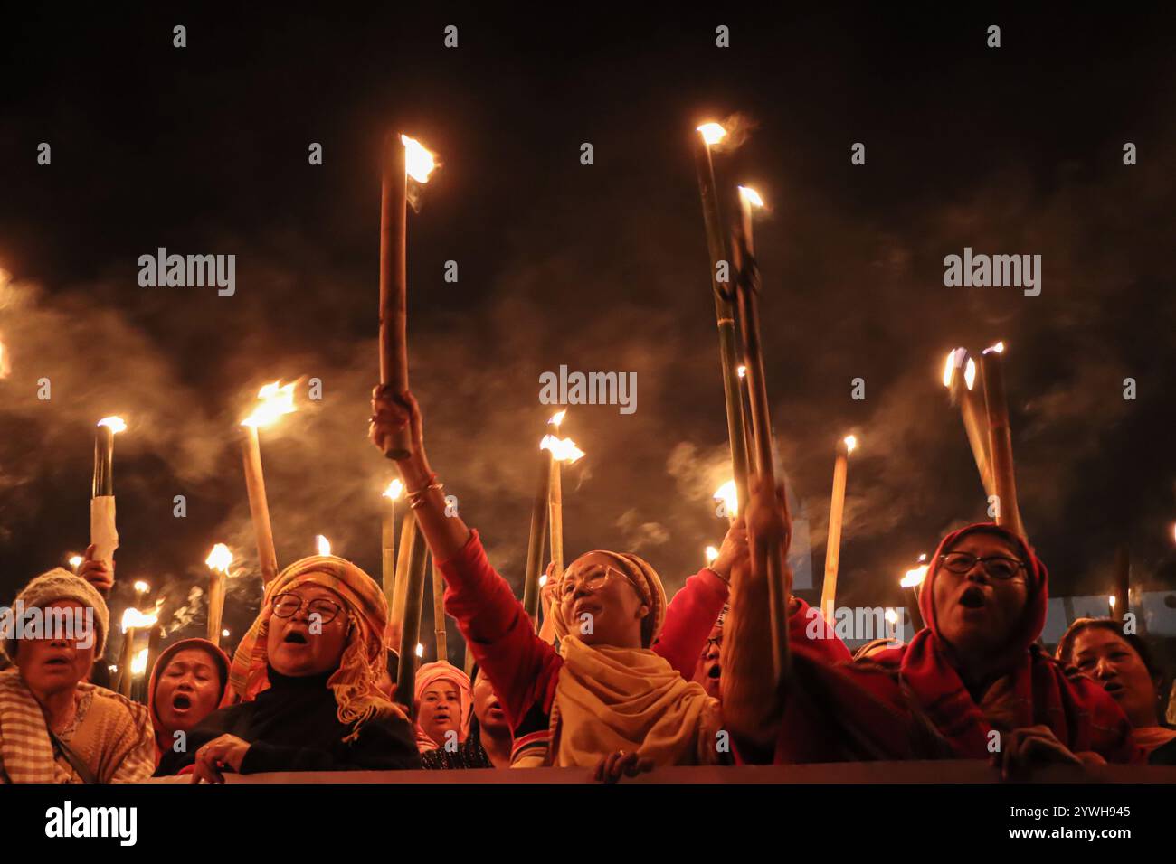 Meira Paibis activists held torches in Imphal, demanding justice for a ...