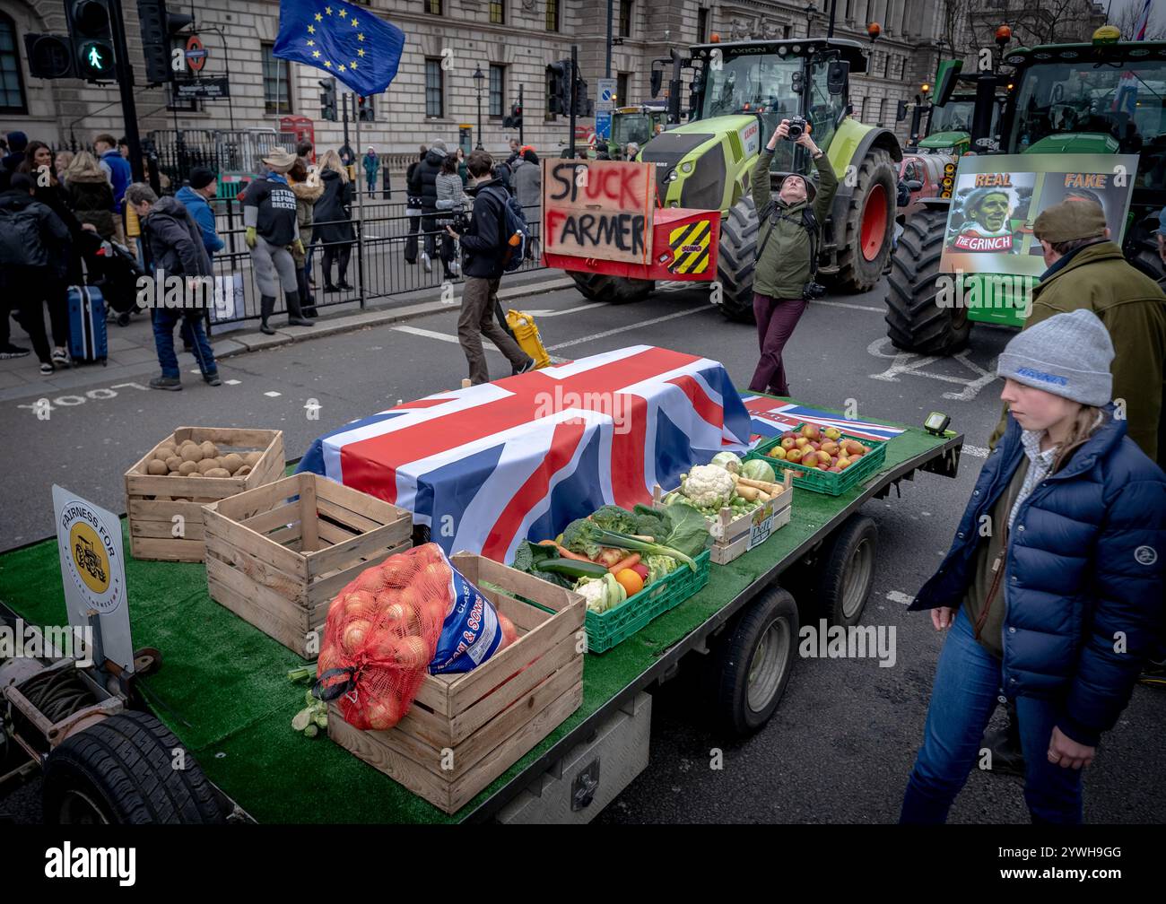 London, UK. 11th December 2024. British farmers gather with their ...