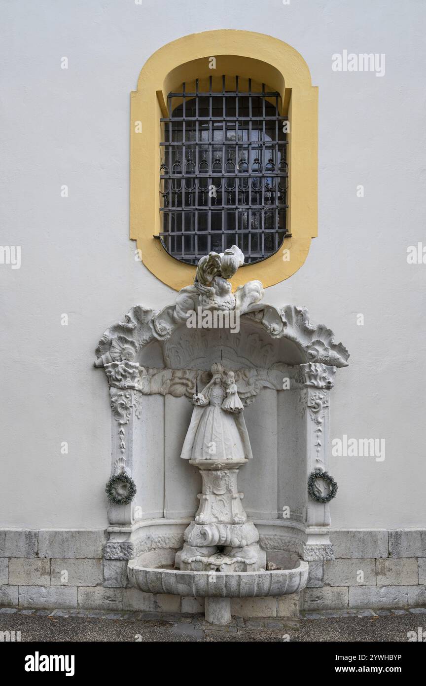 Fountain with the sculpture of the Virgin Mary at the pilgrimage ...