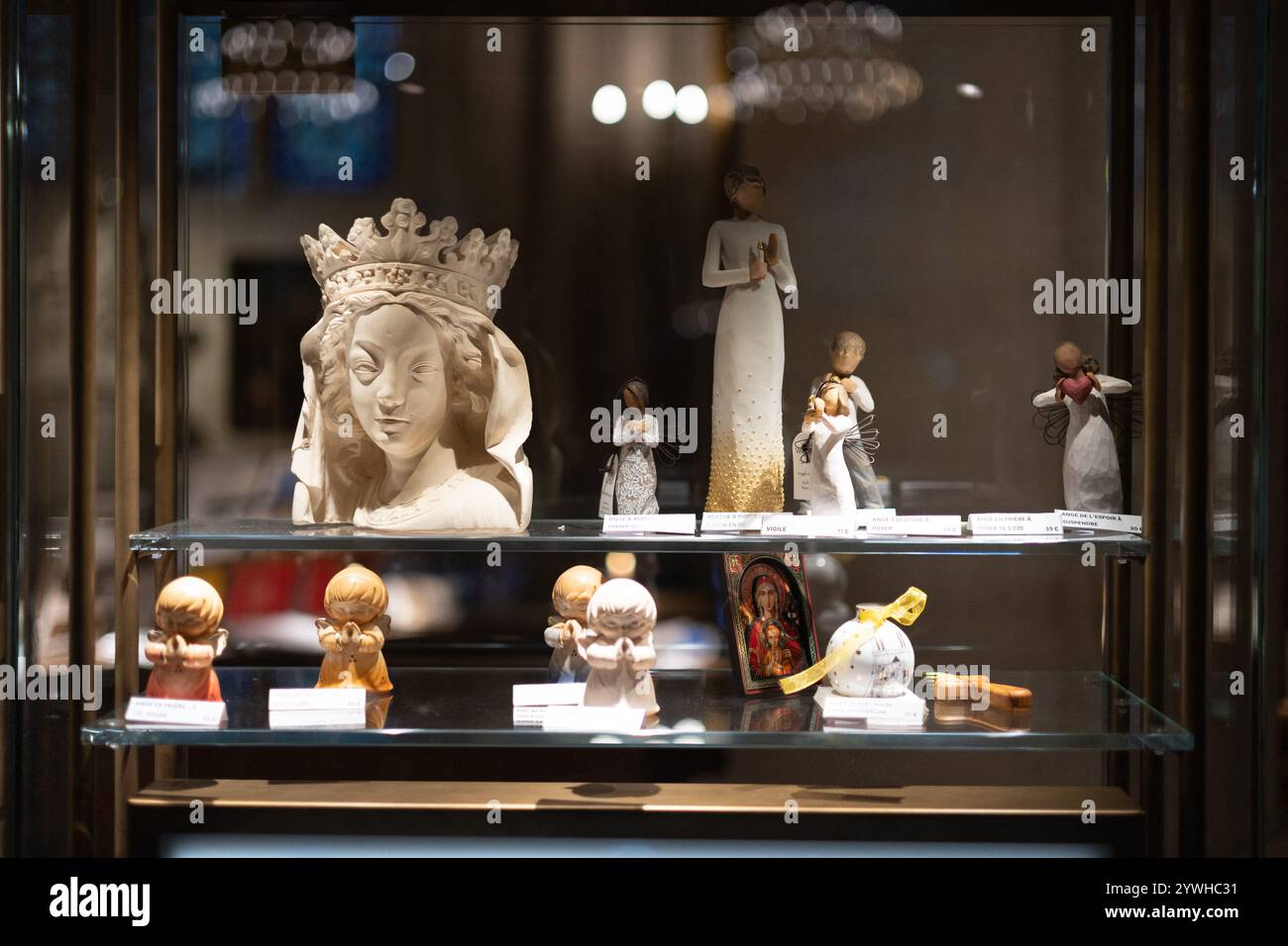 Souvenir shop inside of the Notre Dame Cathedral during a mass ...