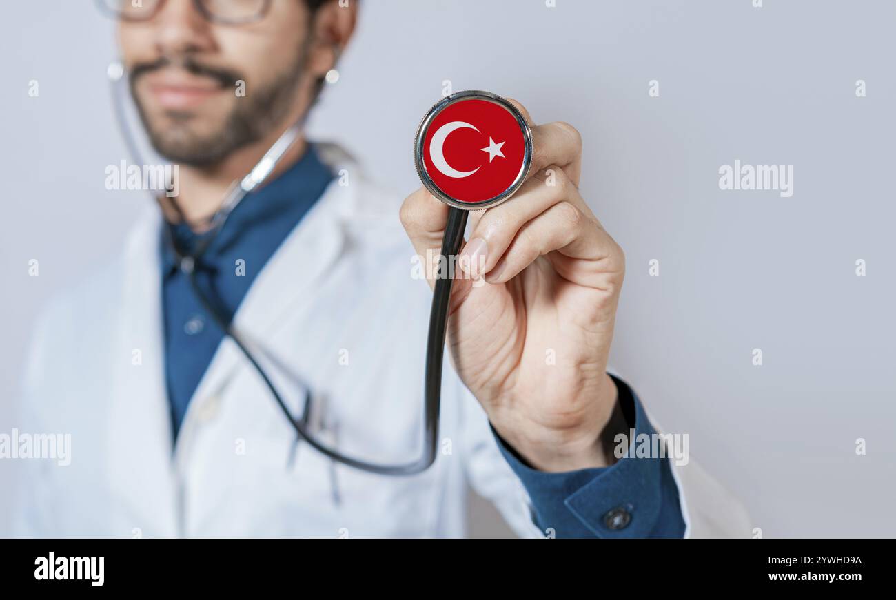 Doctor holding stethoscope with Turkey flag. Turkish Health and Care ...