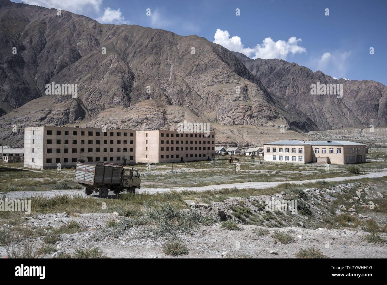 Abandoned, destroyed residential buildings, old Soviet apartment blocks ...