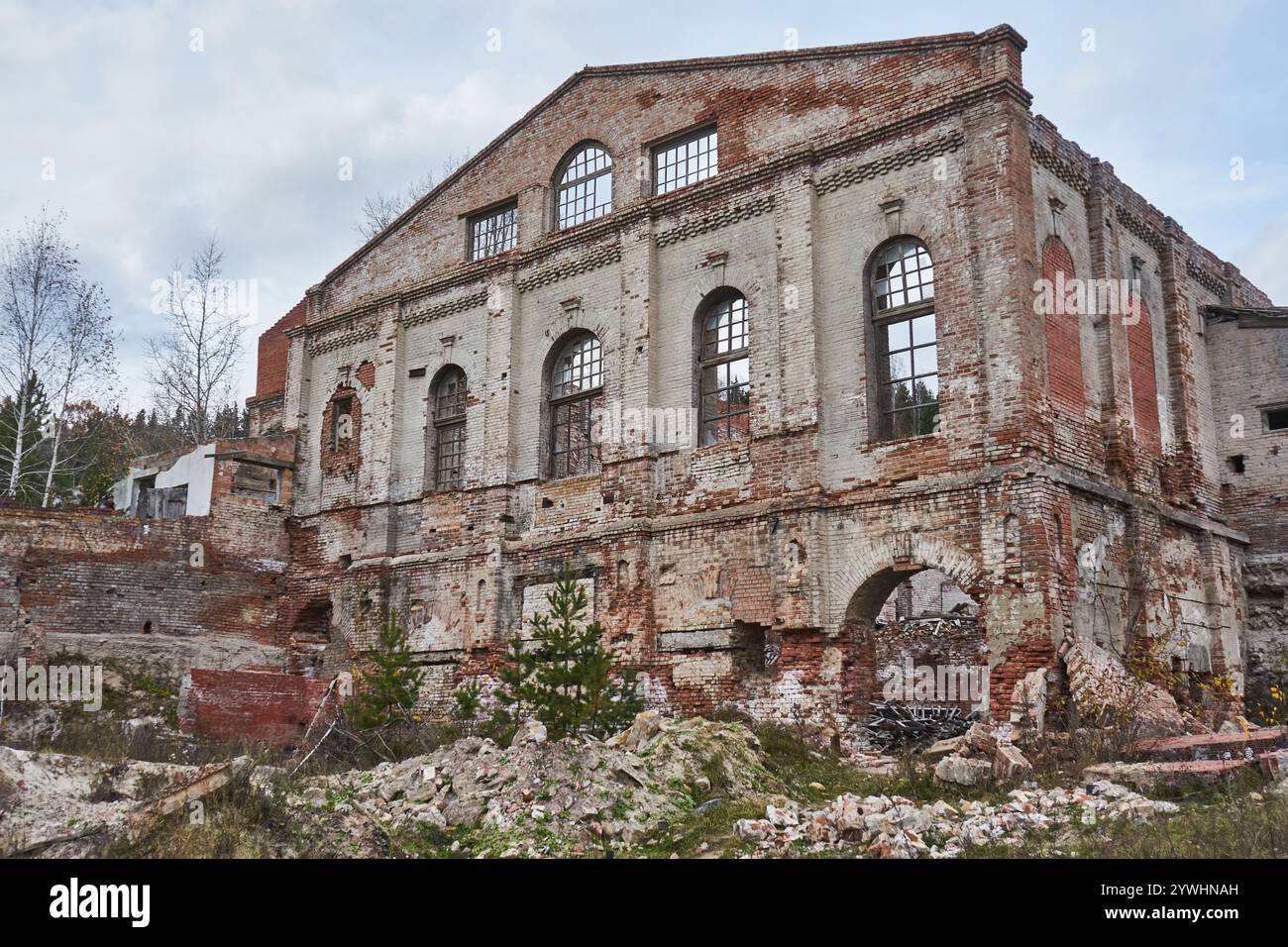 Abandoned destroyed brick building built in 1912. Old facility ...