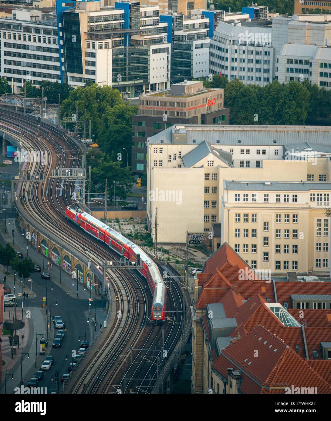 Urban transport flows along curved railway tracks in a bustling ...