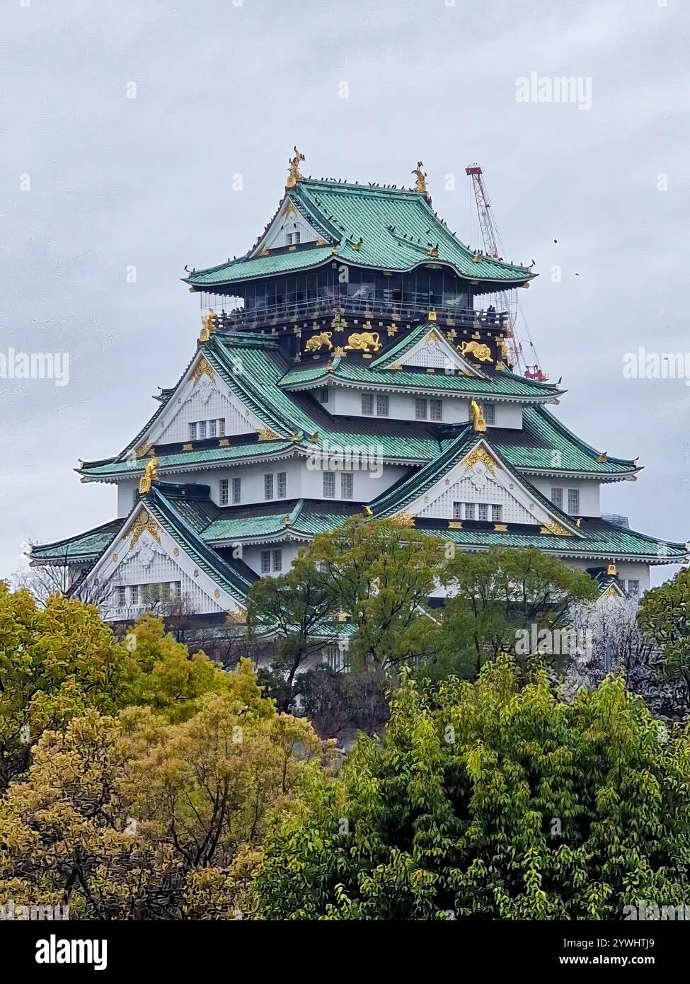 Osaka Castle in Japan features a green and gold roof, multi tiered ...