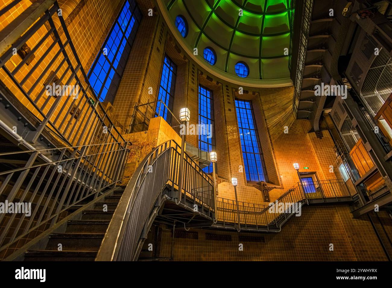 Unique architectural interior showcasing a spiral staircase and stained glass windows Stock ...