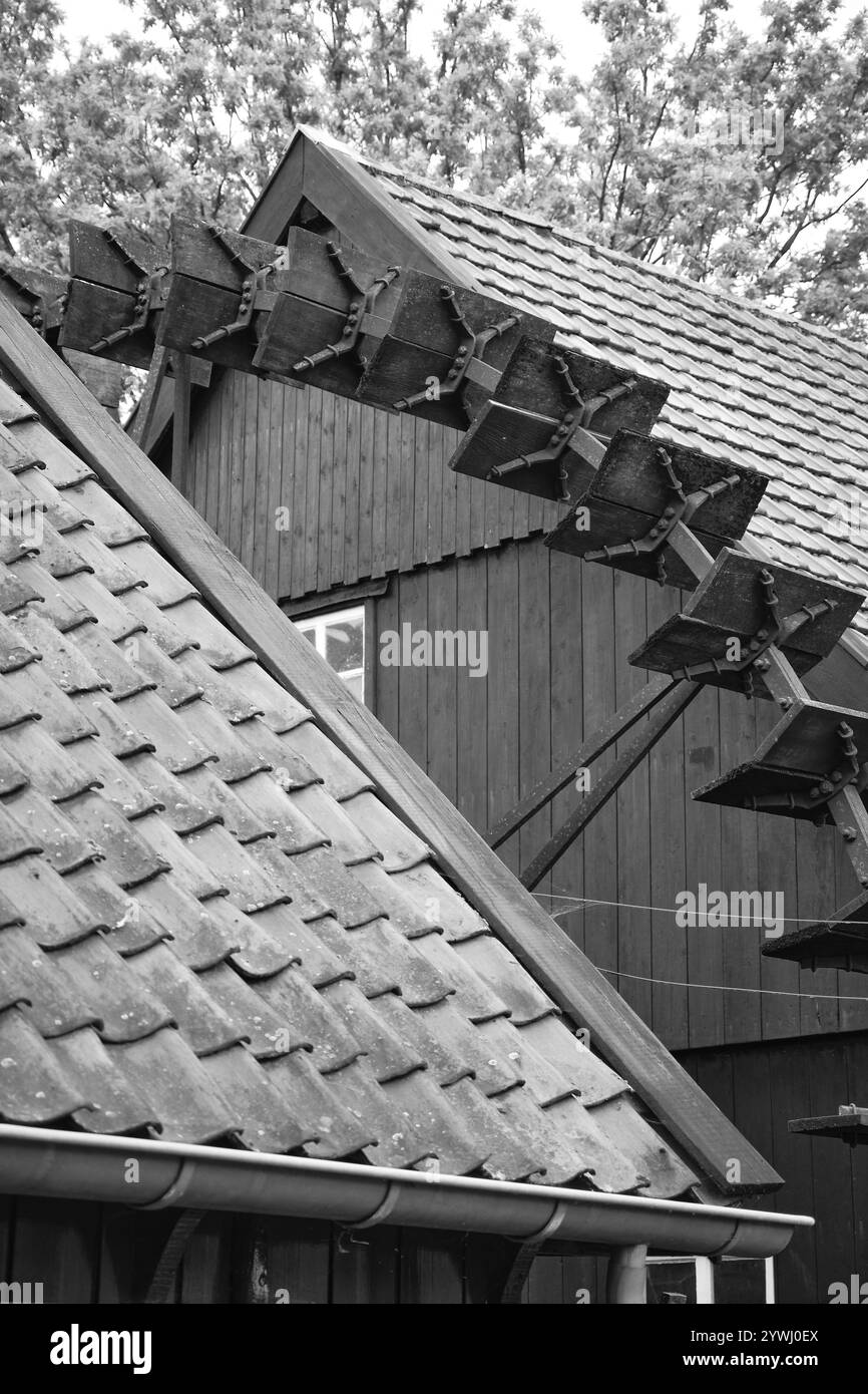 A close-up of the water wheel at De Opwettense Watermolen, a historic ...