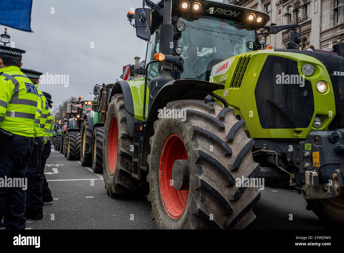 London, England., 11th Dec 2024. Farmers converged on Parliament Square ...
