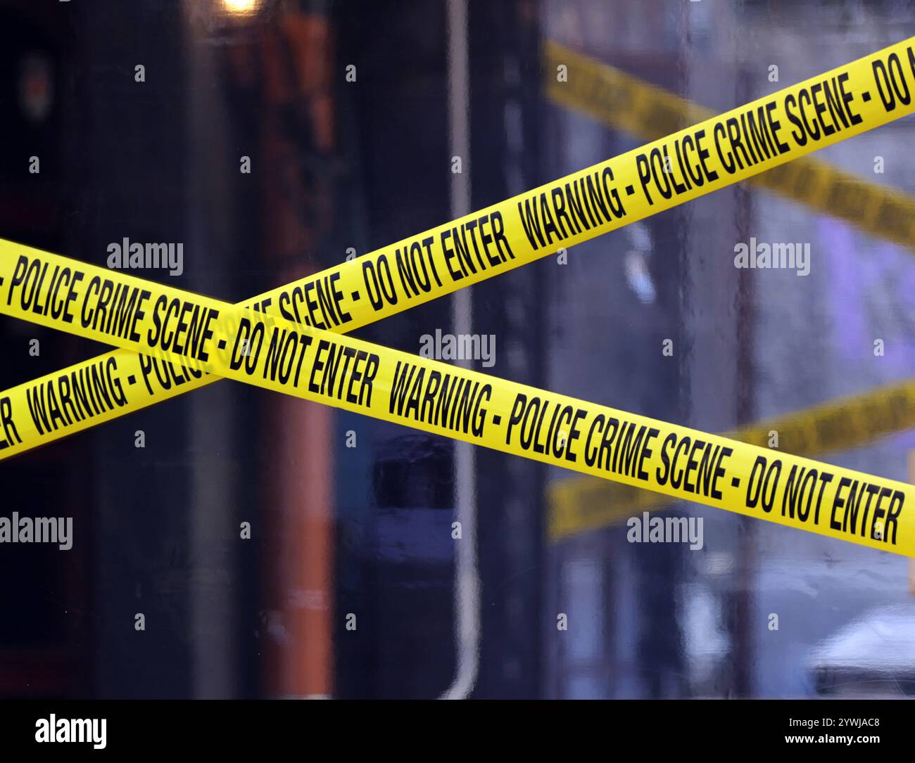 Yellow tapes with the inscription "POLICE - CRIME SCENE - DO NOT ENTER WARNING Stock Photo - Alamy