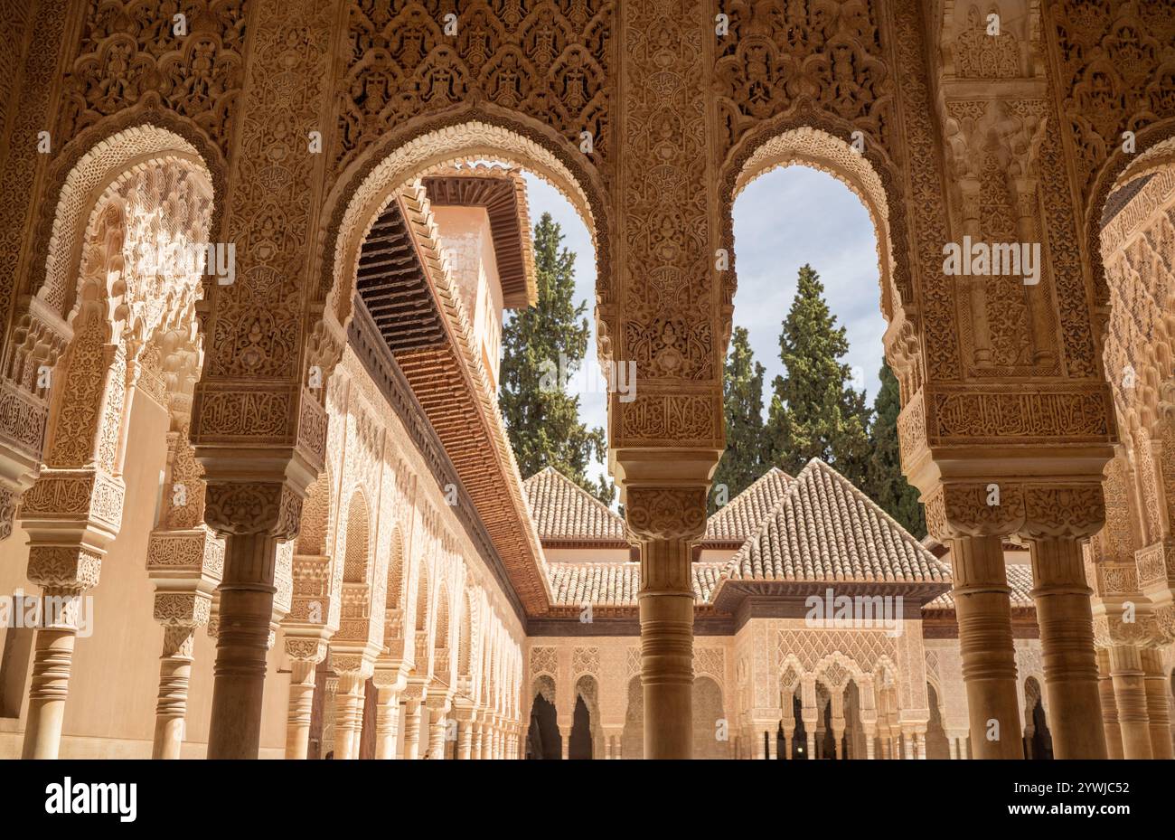 Court of the Lions surrounding with arches and columns decorated ...