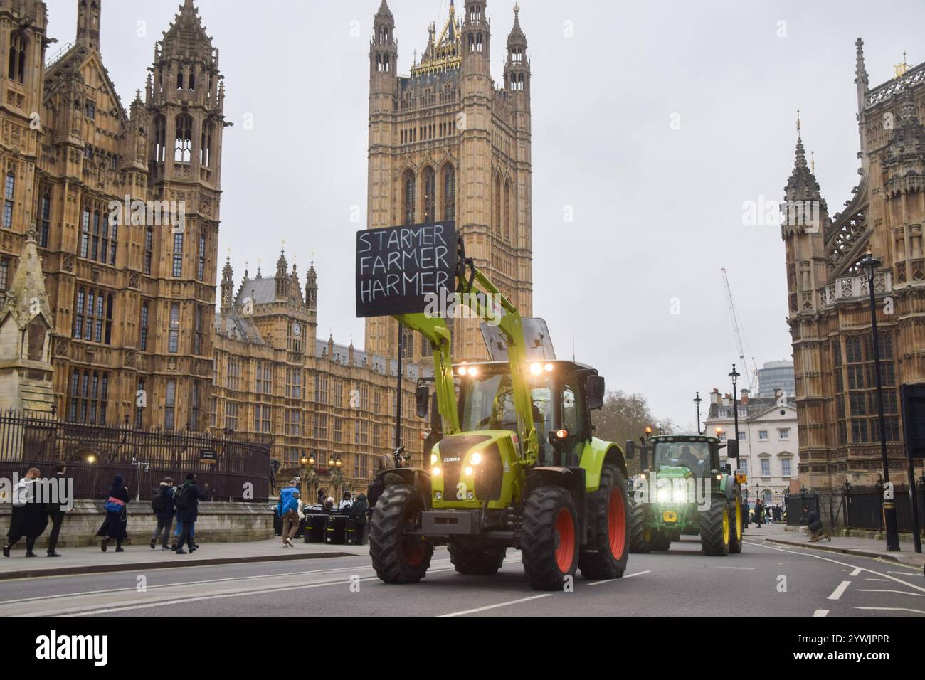 London, UK. 11th Dec, 2024. A tractor with a 'Starmer Farmer Harmer ...