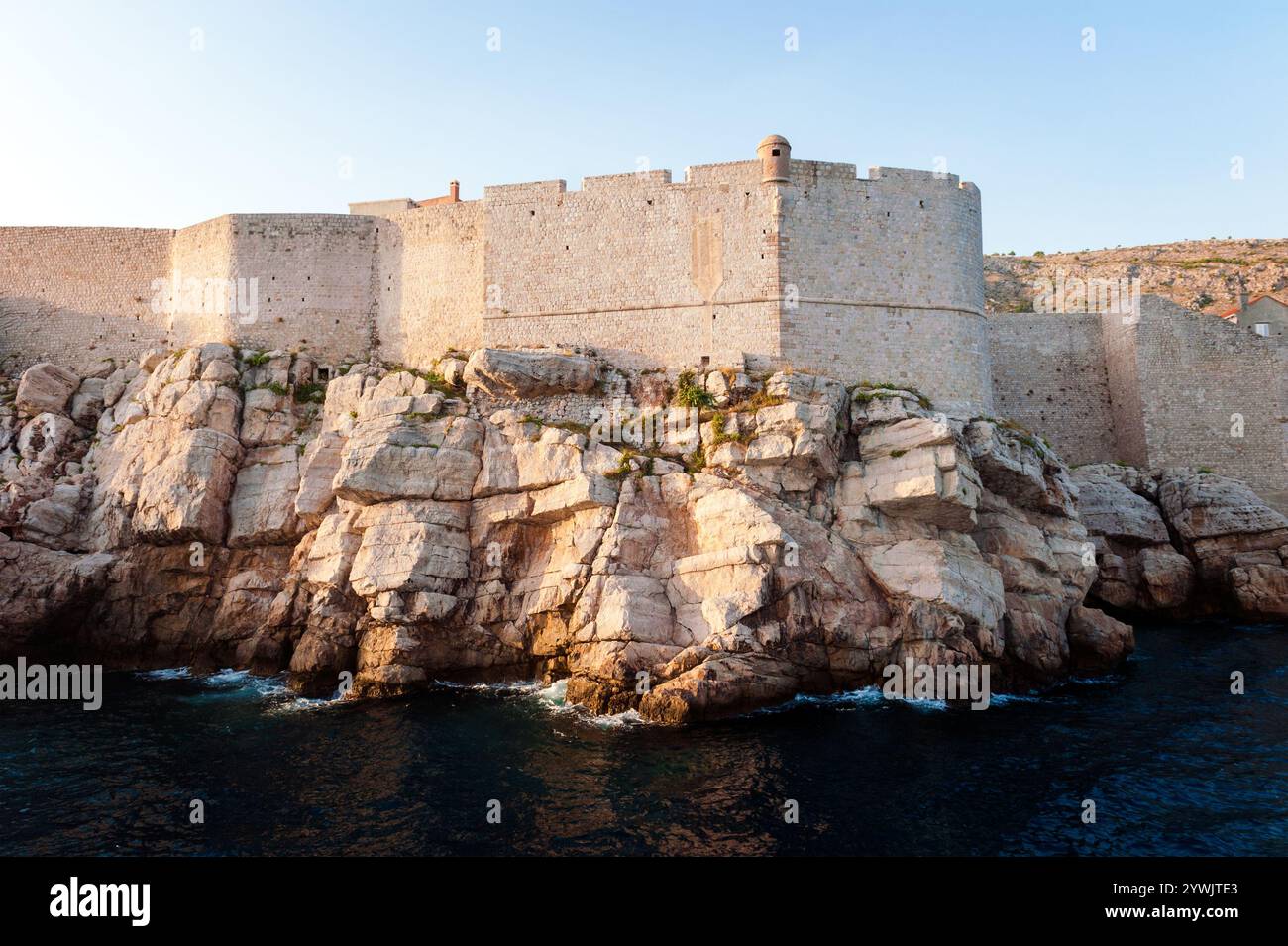 View from the open sea to the defensive city walls of Dubrovnik Stock ...