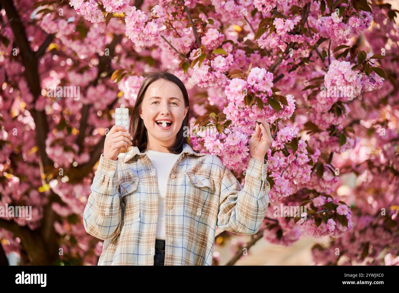 Woman allergic suffering from seasonal allergy at spring. Young happy ...