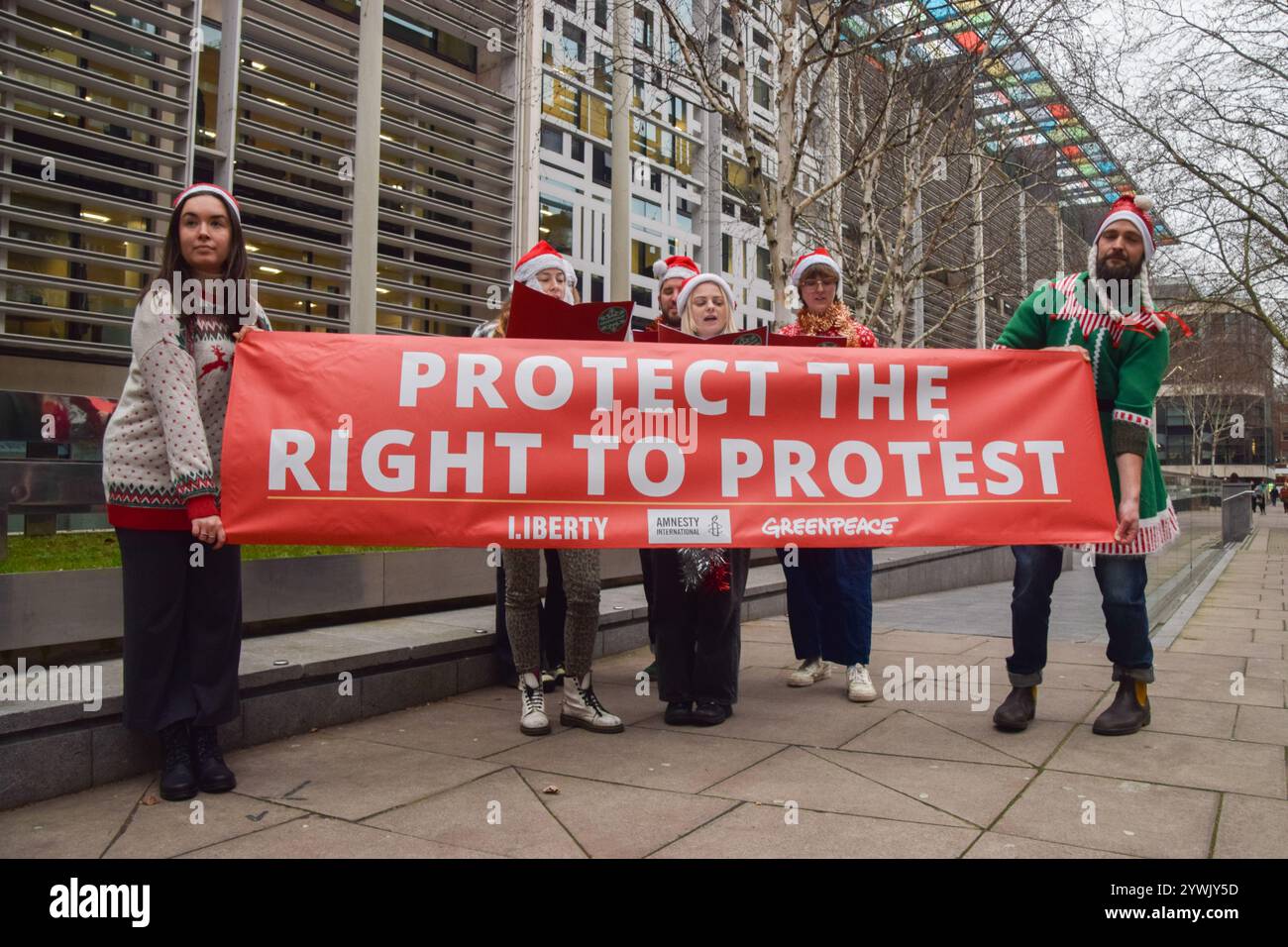 London, England, UK. 11th Dec, 2024. Activists from Amnesty ...