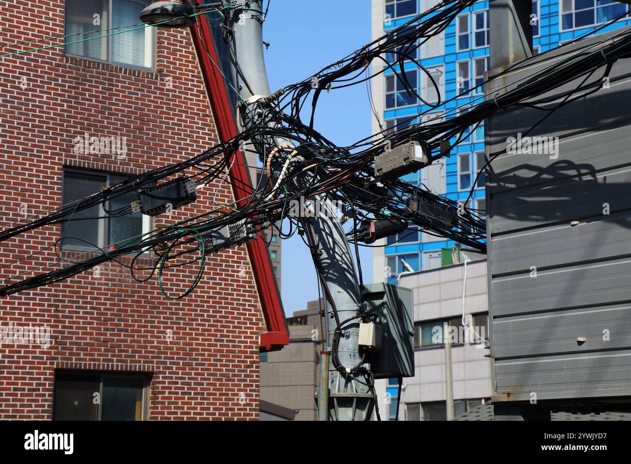 Internet connection lines in South Korea. Utility pole in Seoul city ...