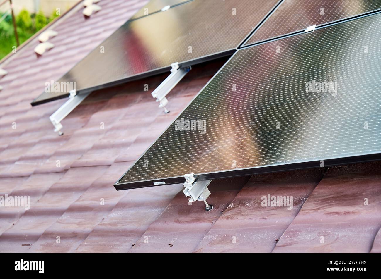 Solar panels, securely fastened with robust mounting clamp to ...