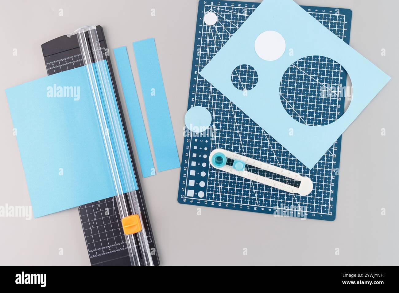 a collection of crafting tools and materials used for cutting circles ...