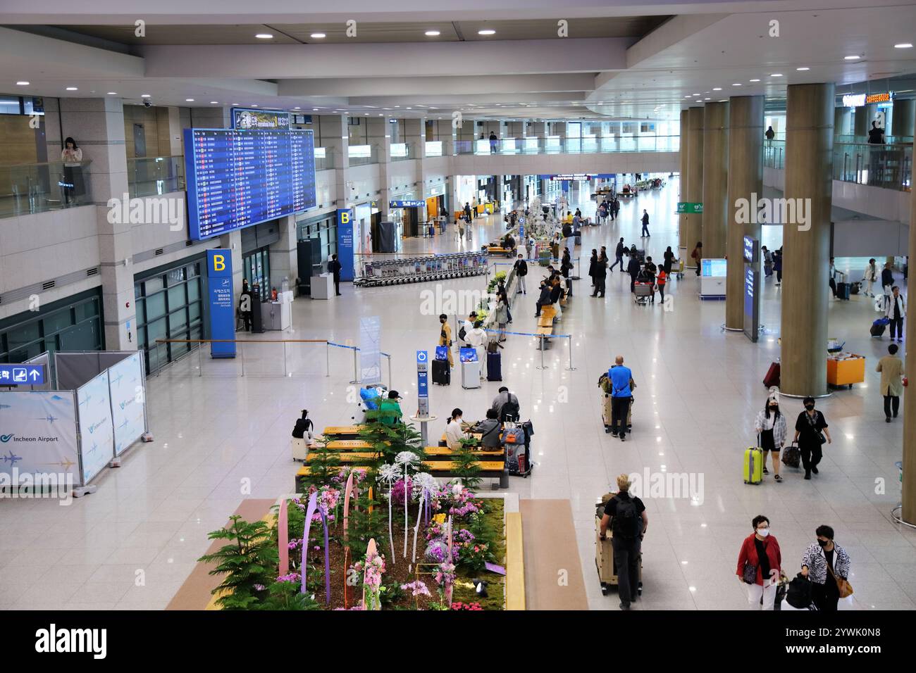 SEOUL, SOUTH KOREA - APRIL 10, 2023: Passengers hurry at Seoul Incheon ...