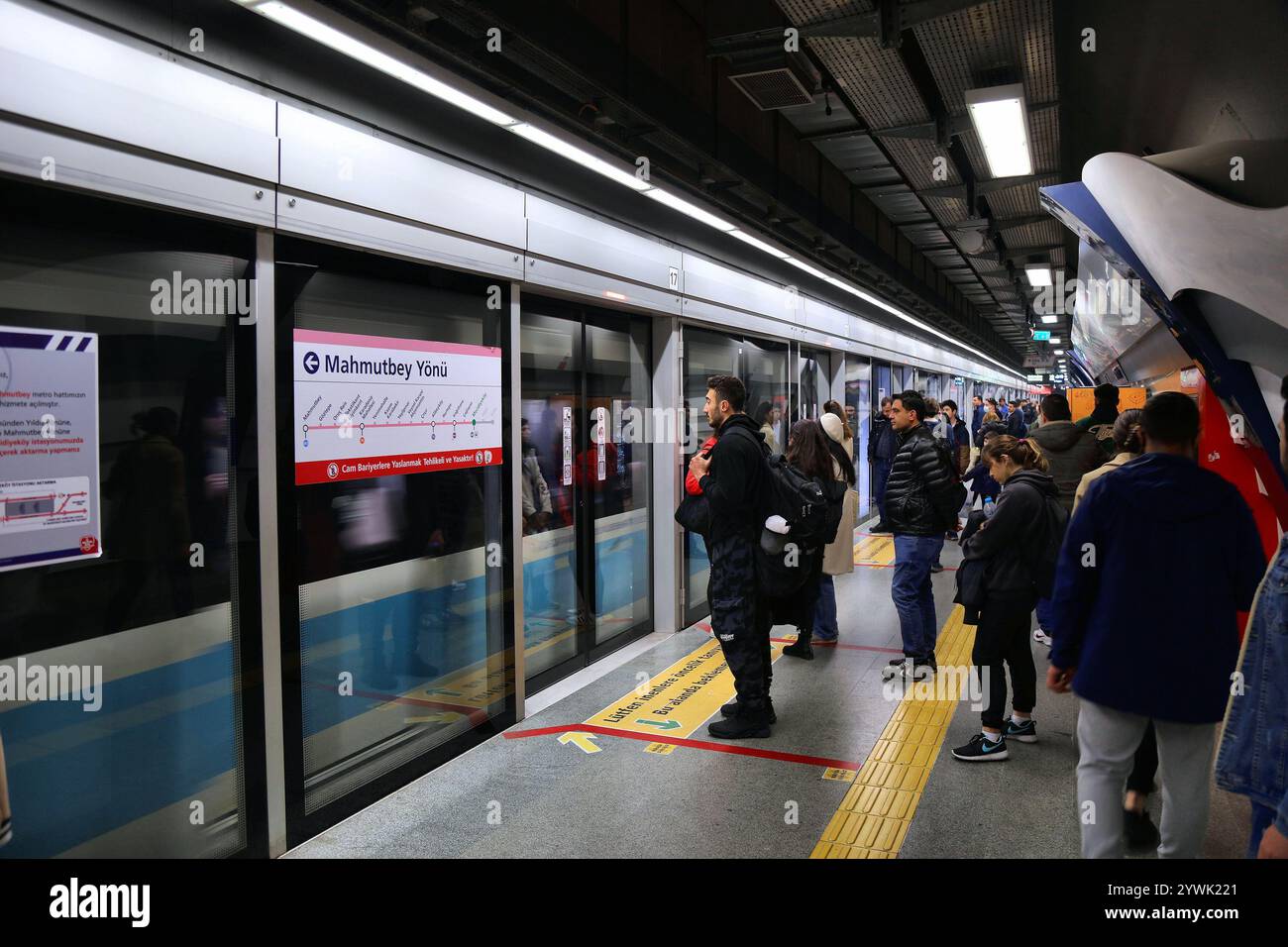 ISTANBUL, TURKEY - MARCH 25, 2023: Passengers wait at platform doors at ...