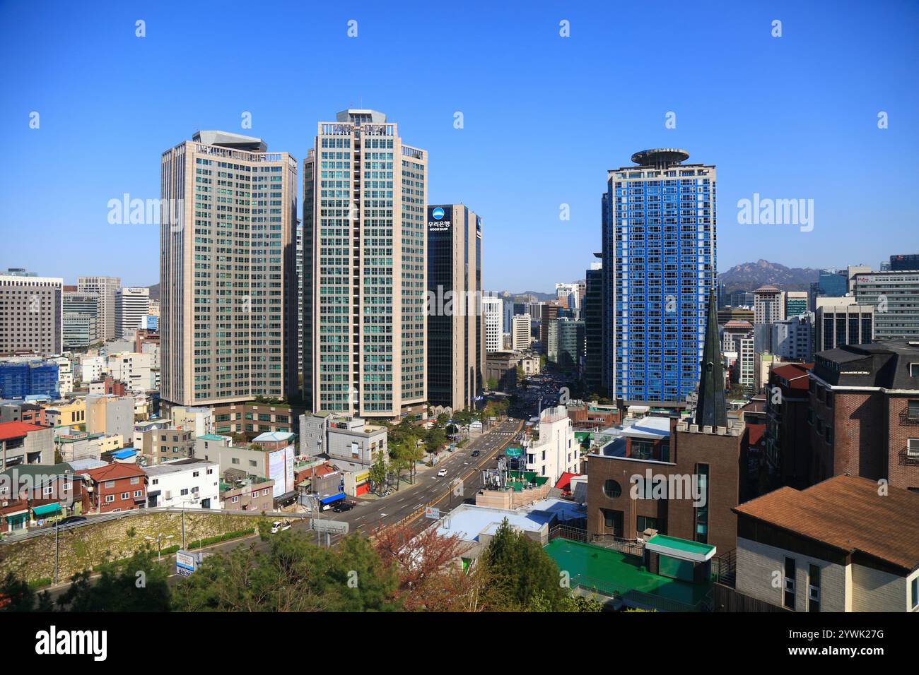 SEOUL, SOUTH KOREA - APRIL 8, 2023: Namsan Lotte Castle Iris (left) and ...