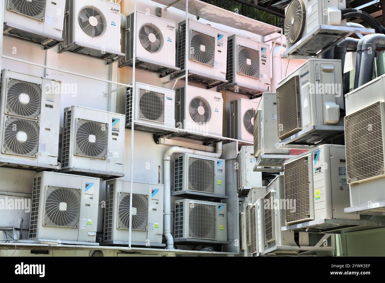 SINGAPORE CITY, SINGAPORE - MARCH 13, 2024: Daikin, Mitsubishi Electric ...